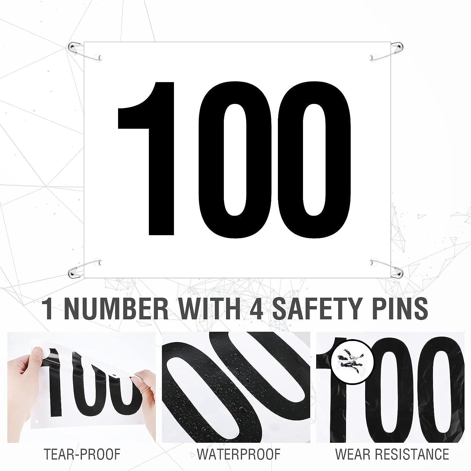 Running Bib Numbers with Safety Pins for Marathon Sports Competition ...