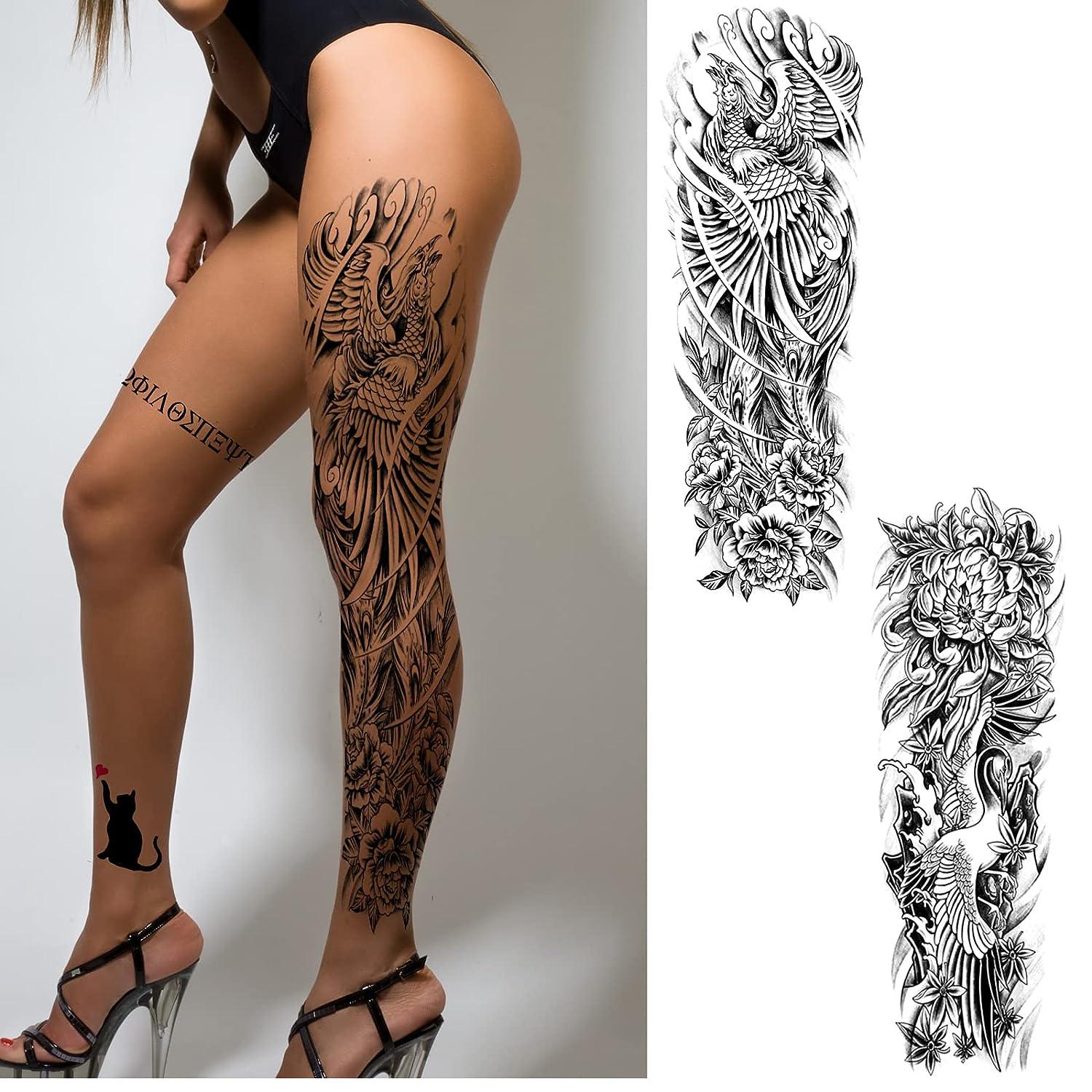 realistic snake tattoo sleeve