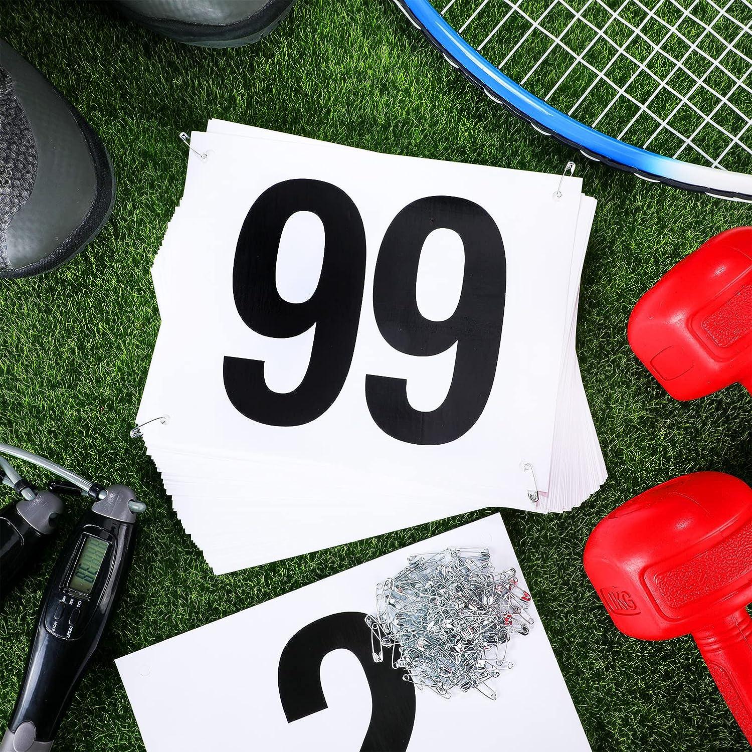 Running Bib Numbers with Safety Pins for Marathon Sports Competition ...